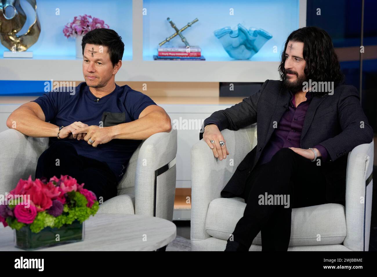 Mark Wahlberg, left, and Jonathan Roumie appear on "Fox & Friends" to ...