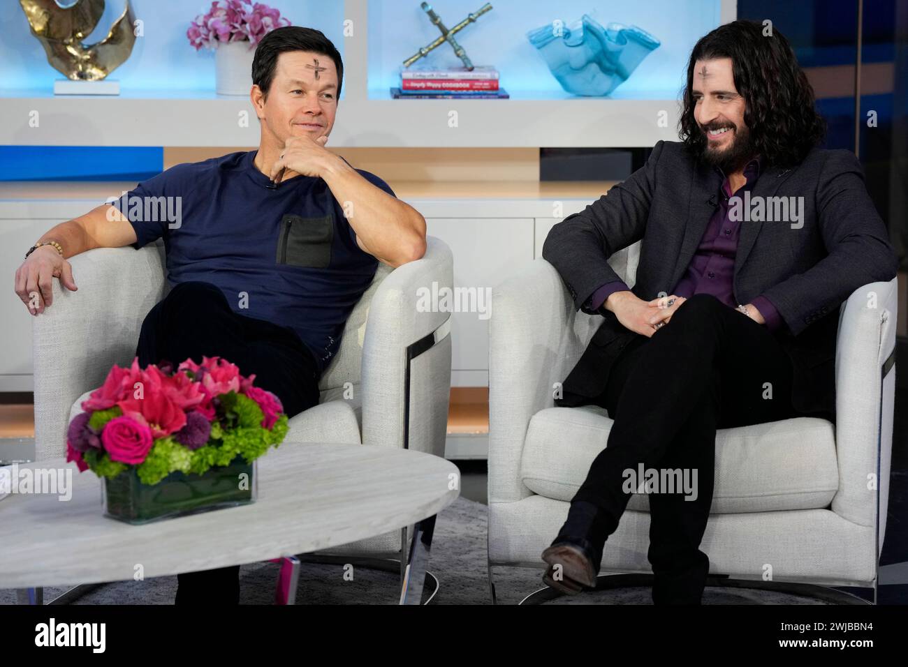 Mark Wahlberg, left, and Jonathan Roumie appear on "Fox & Friends" to ...