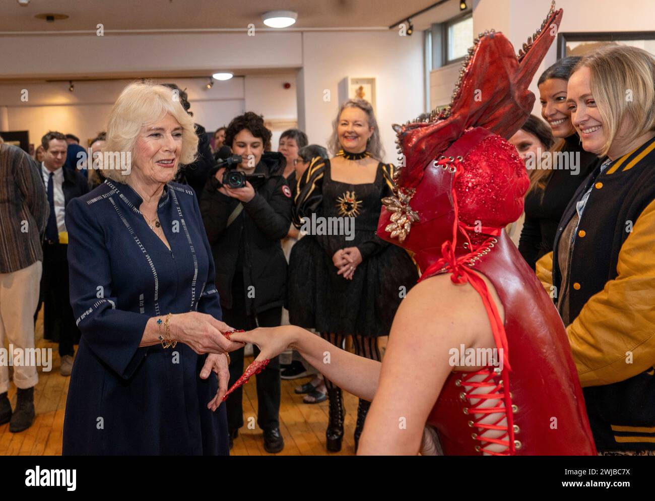 Queen Camilla meeting artist Syban Velaidi-Lauder during a visit to ...