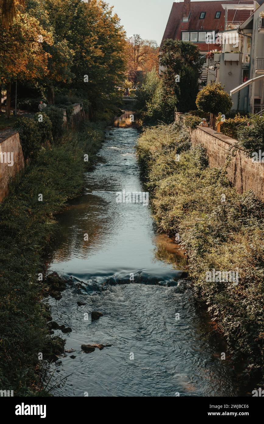 Beautiful small river with clean and clear water front of colorful ...