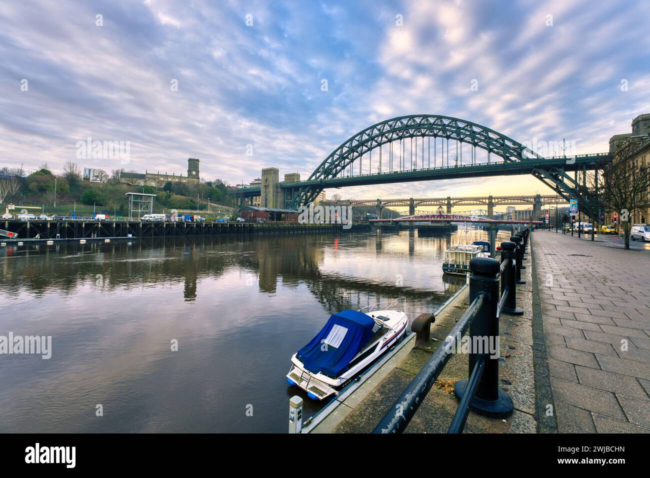 Newcastle Tyne Bridges with reflections in river Tyne and rippling ...