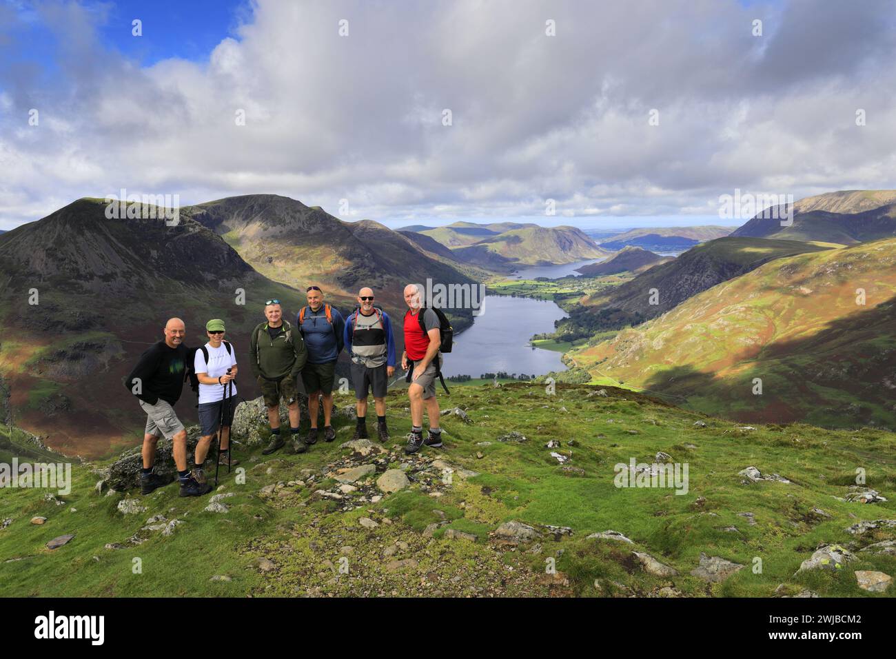 The summit carin of Fleetwith Pike Fell, overlooking Buttermere ...