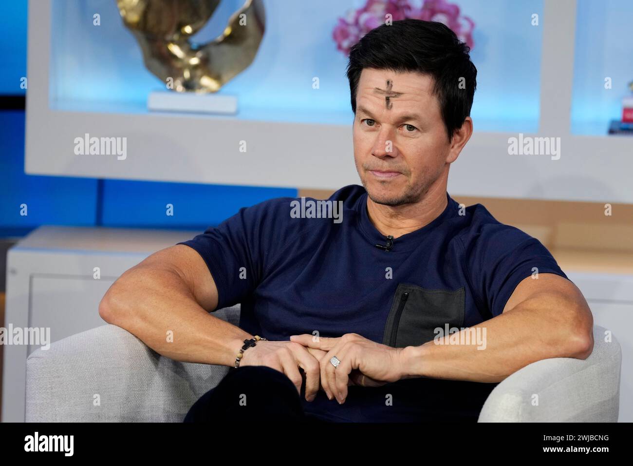 Mark Wahlberg bears a cross of ashes on his forehead as he appears on ...