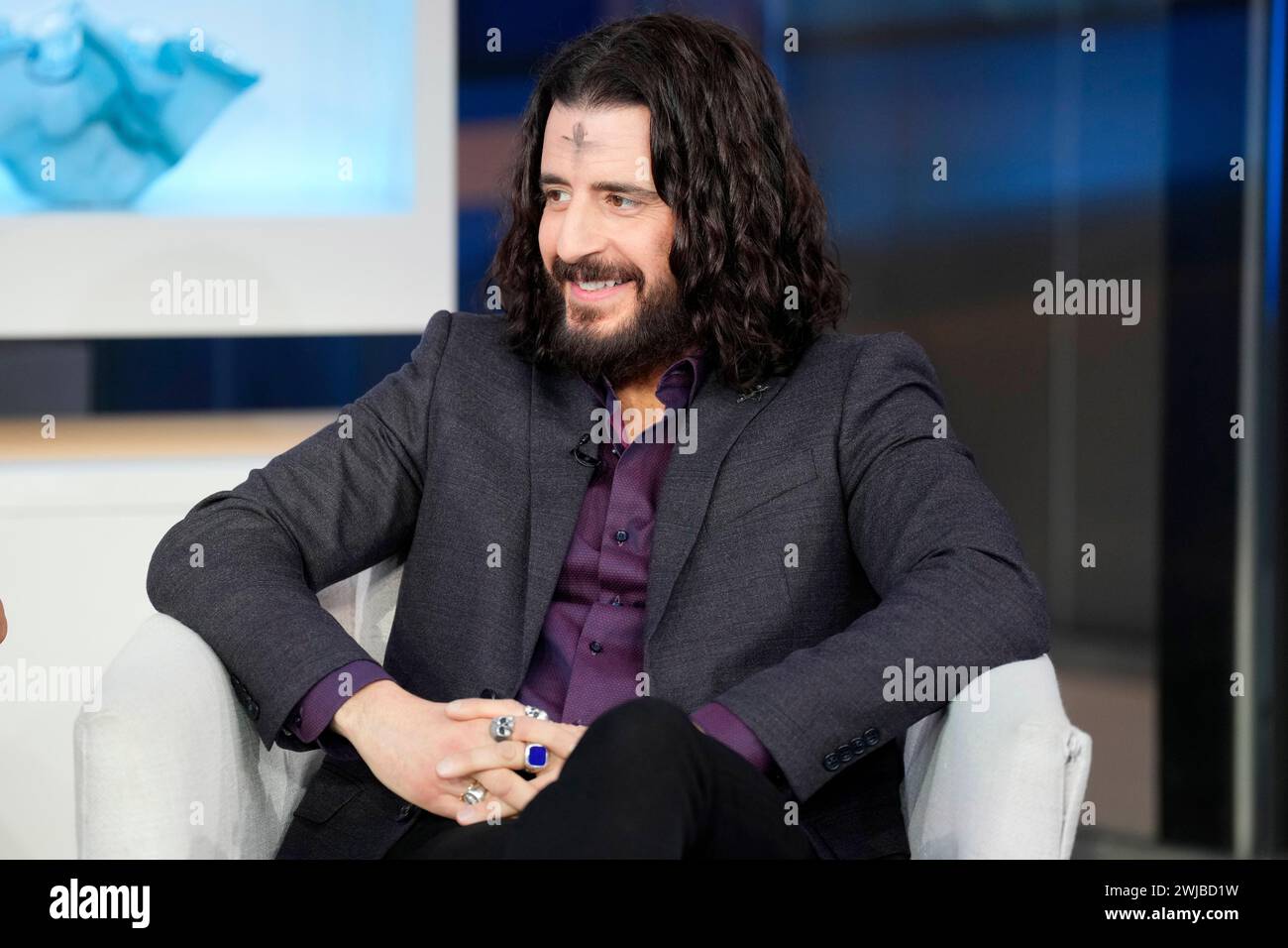 Jonathan Roumie bears a cross of ashes on his forehead as he appears on ...