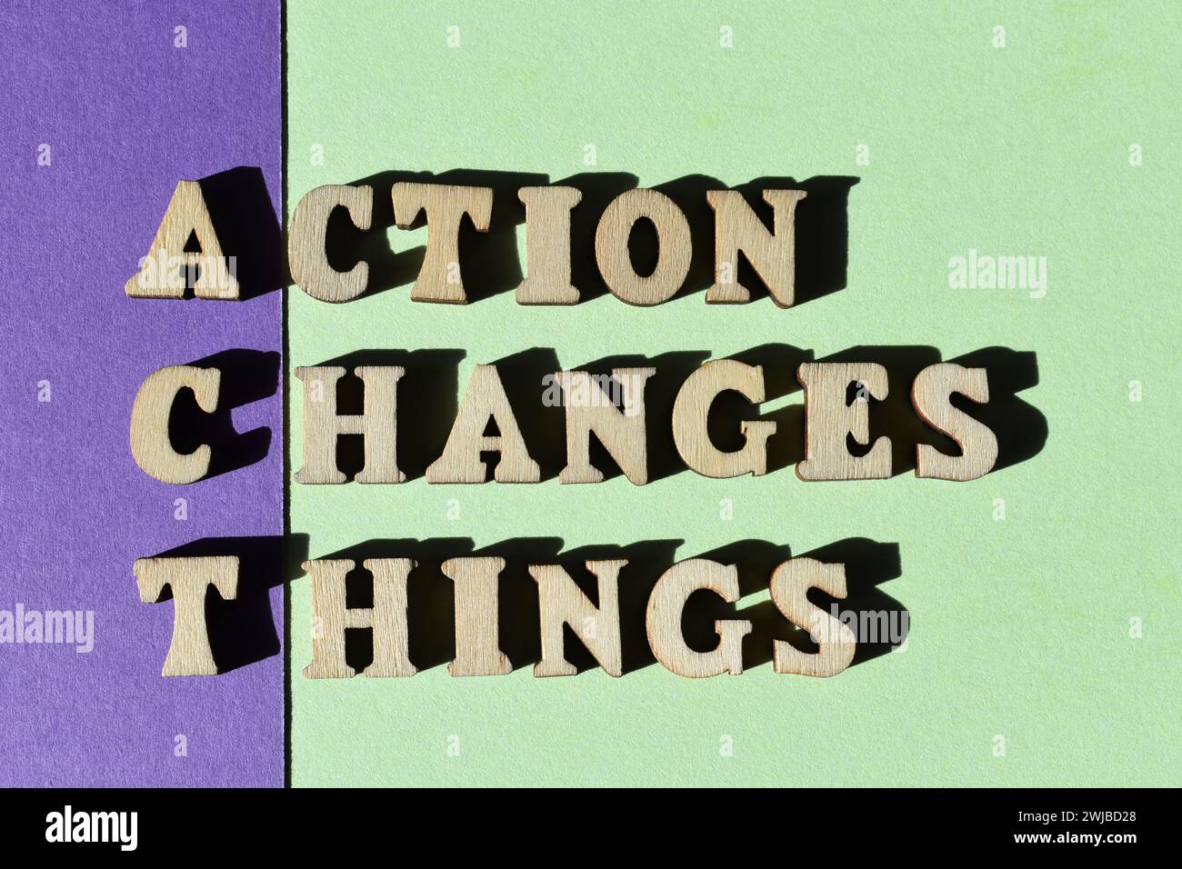 ACT, word and acronym for Action Changes Things, wooden alphabet ...