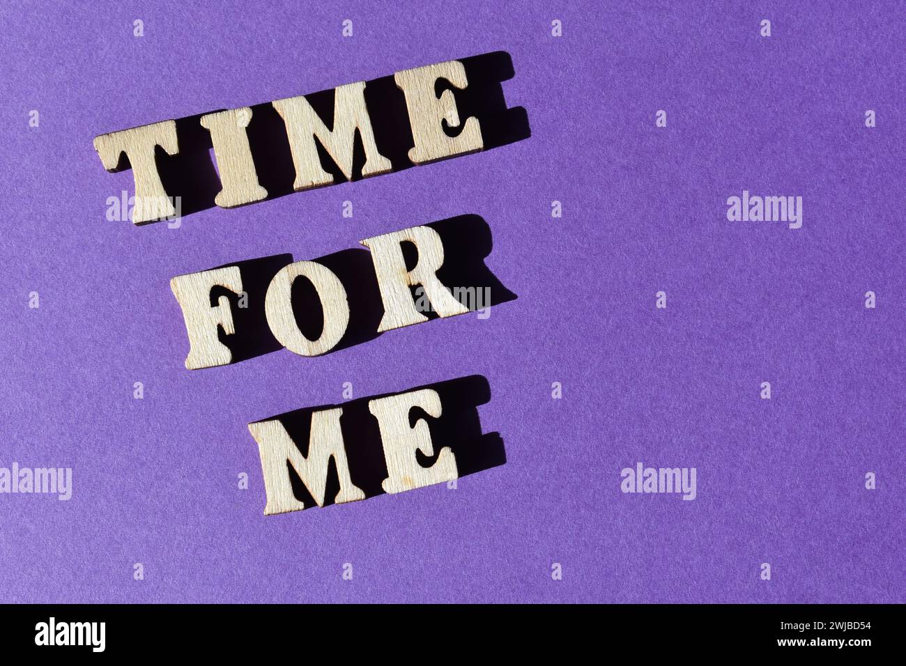 Time For Me, words in wooden alphabet letters isolated on purple ...