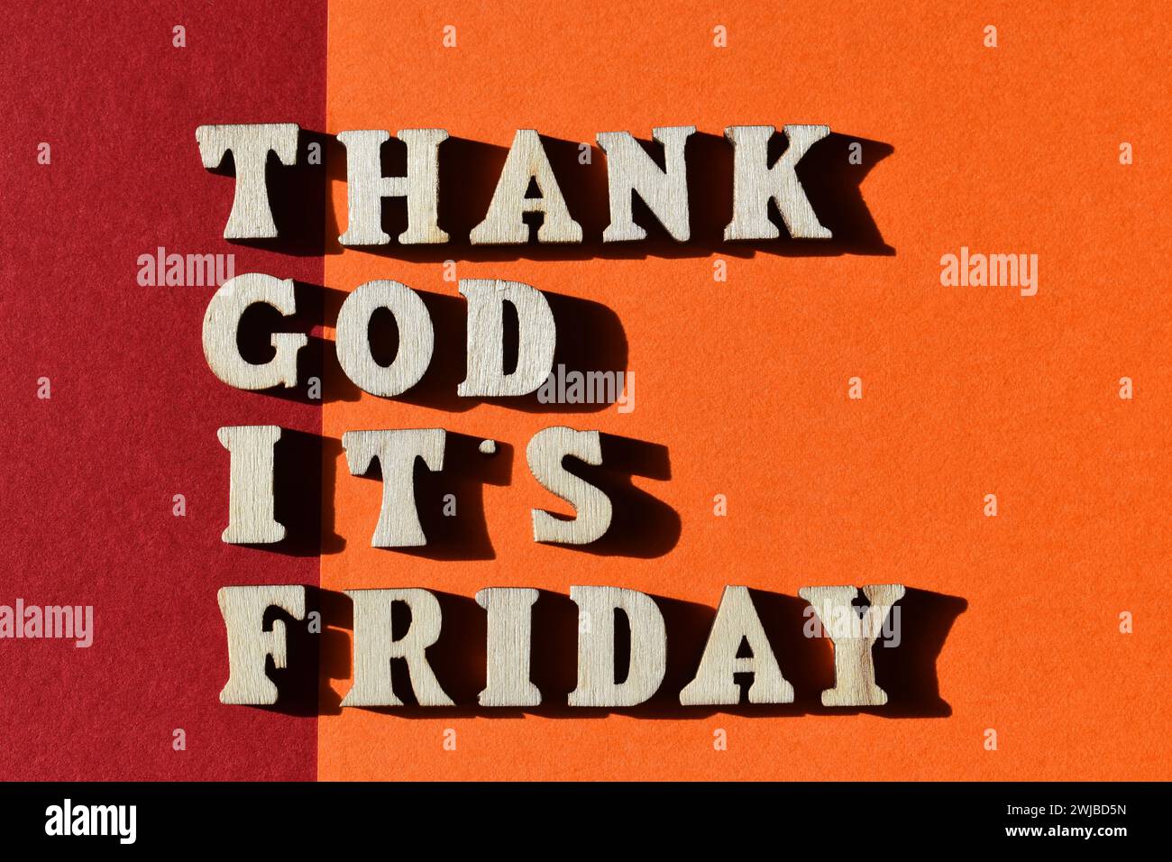Thank God It's Friday, words in wooden alphabet letters isolated on red ...