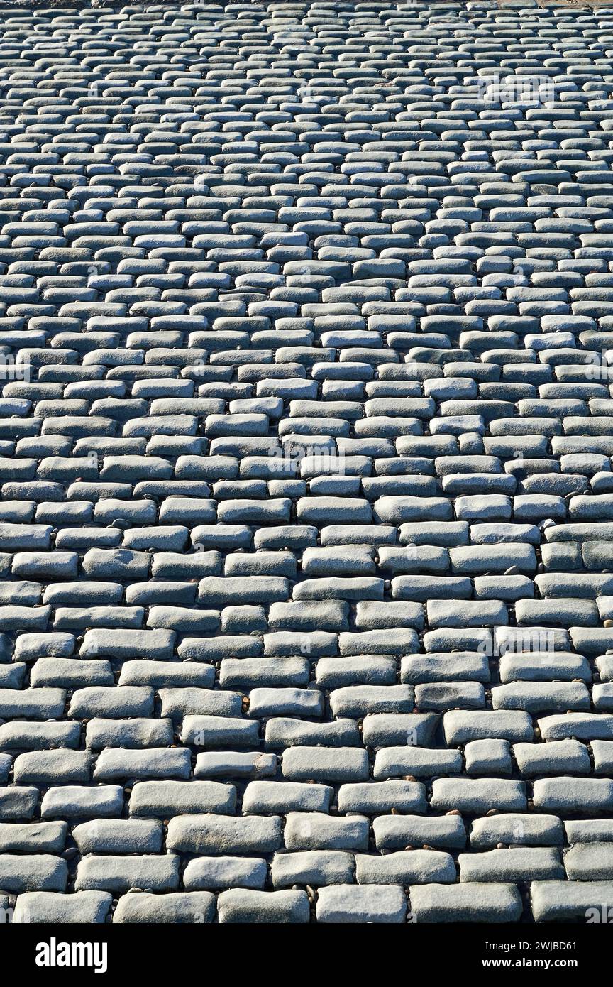 Cobble stones on sloping surface Stock Photo - Alamy