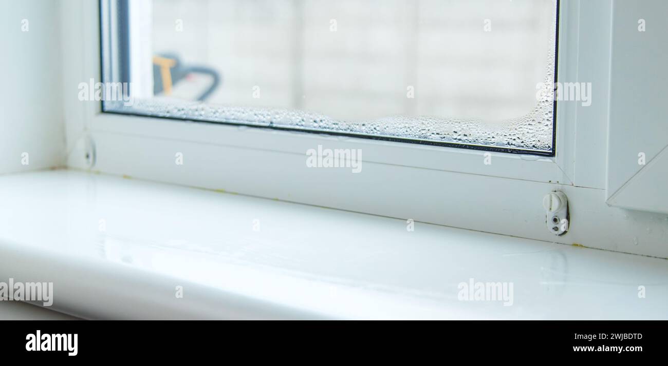 Moisture on a plastic window. Selective focus Stock Photo - Alamy