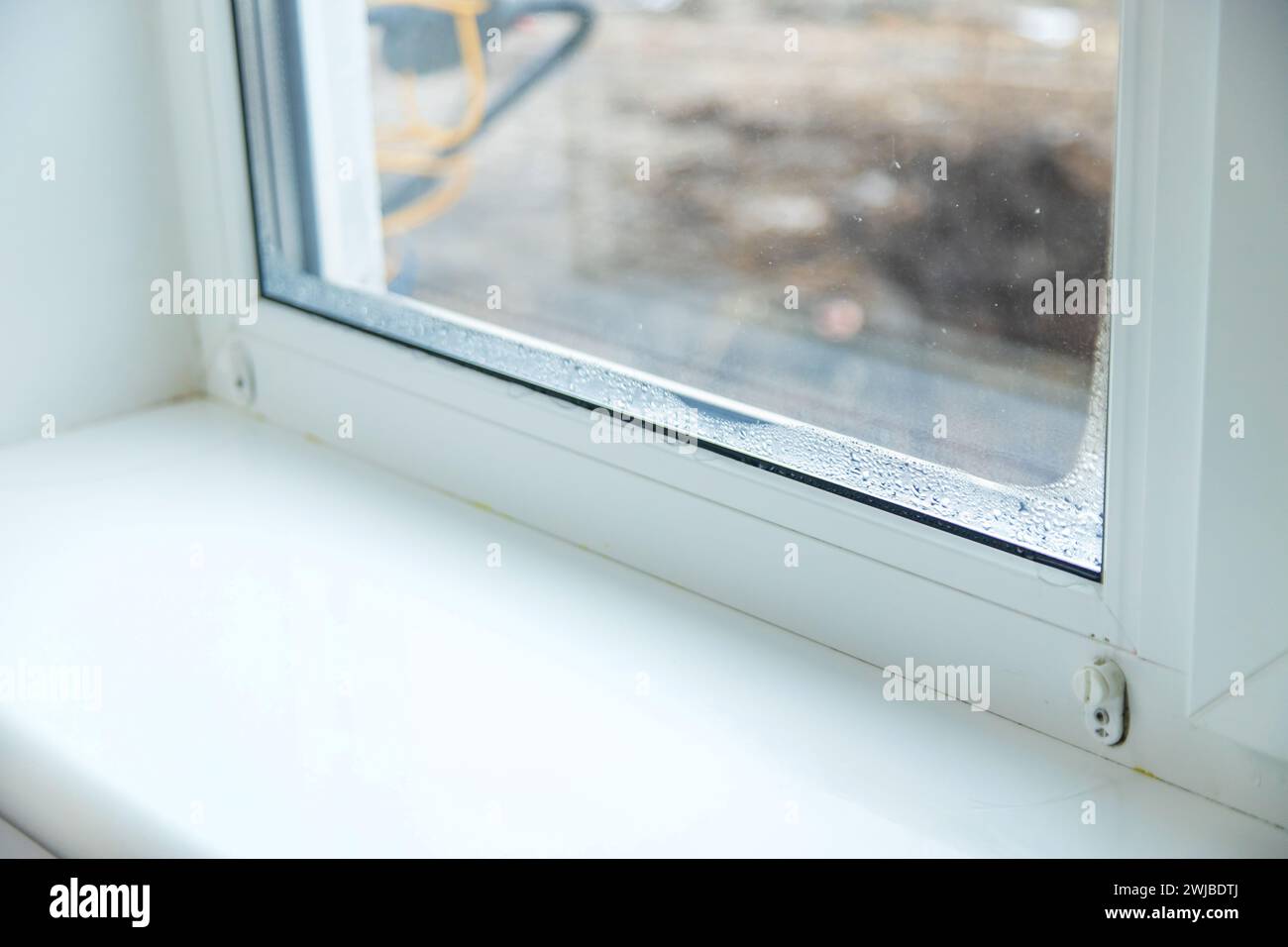Moisture on a plastic window. Selective focus Stock Photo - Alamy