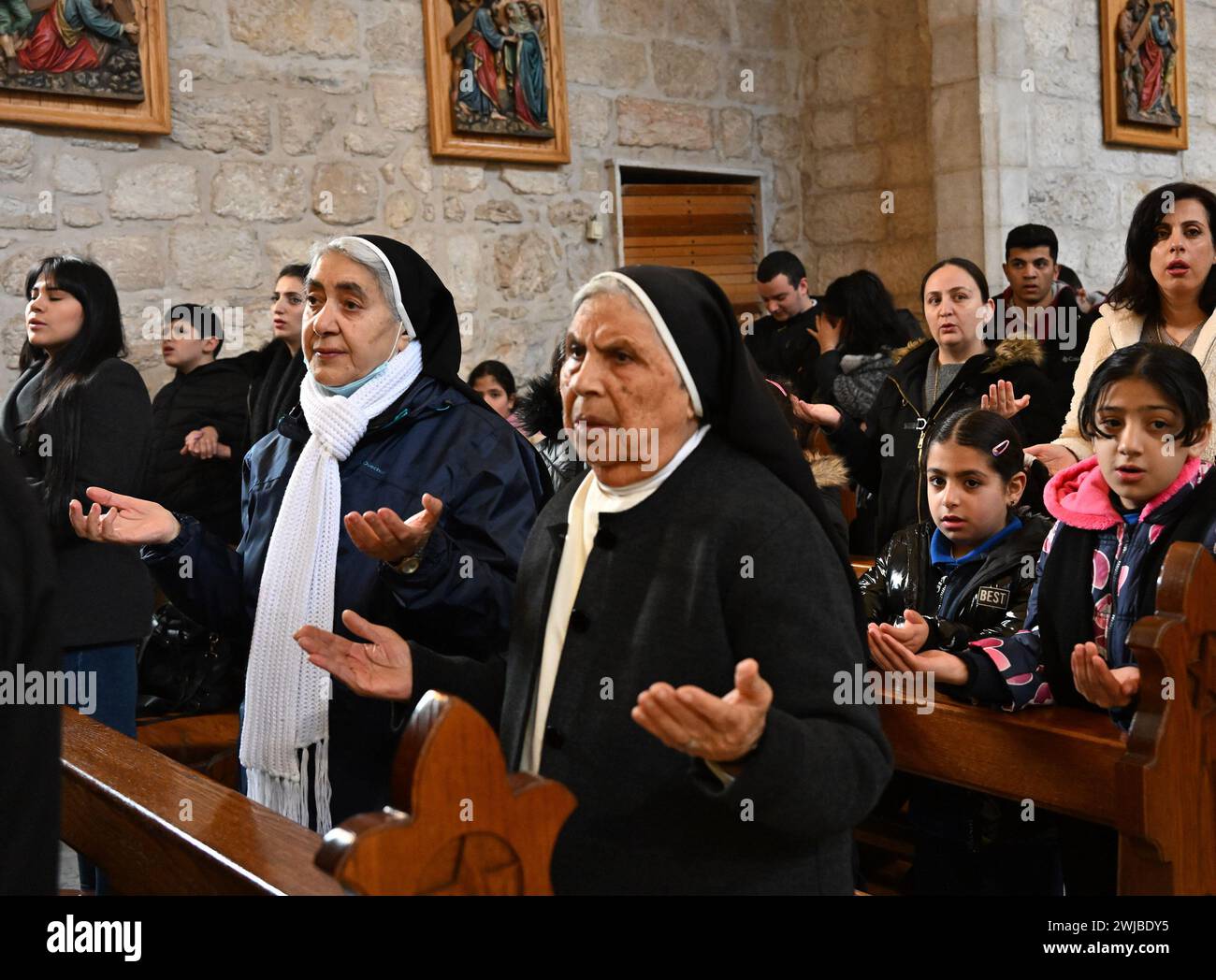 Bethlehem, West Bank. 14th Feb, 2024. Catholic nuns pray during Ash ...