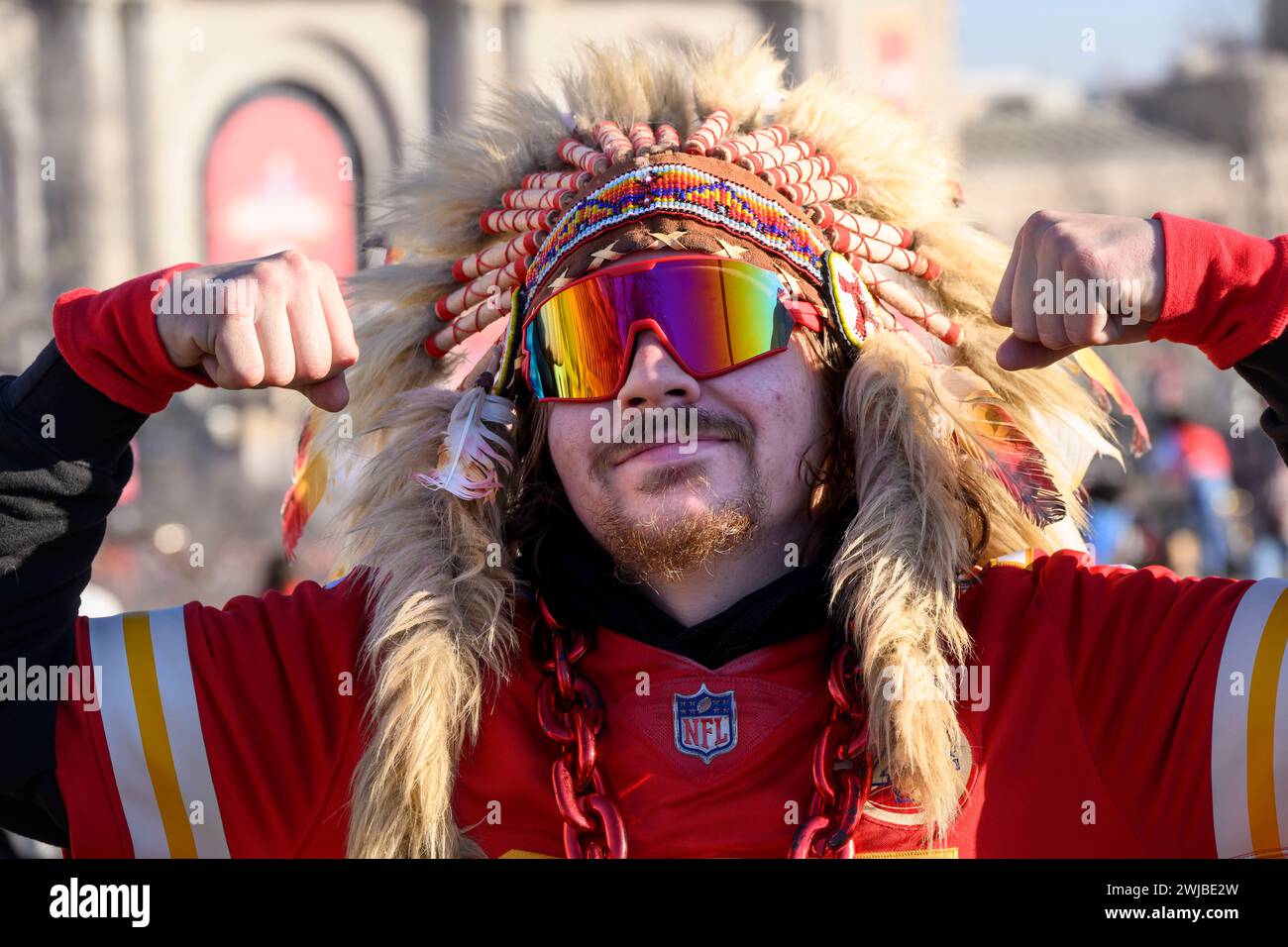 A Kansas City Chiefs fan wears a Native American headdress at a Super ...