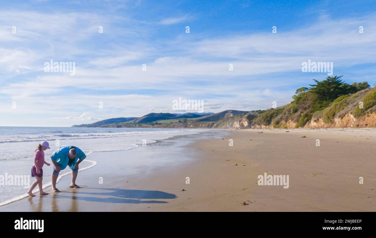Father, Daughter Stroll El Capitan Beach, California Stock Photo - Alamy