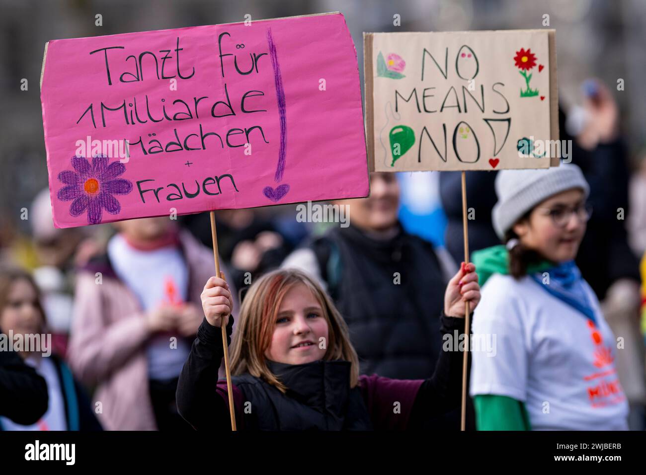 Munich, Germany. 14th Feb, 2024. A participant in a dance flash mob and ...