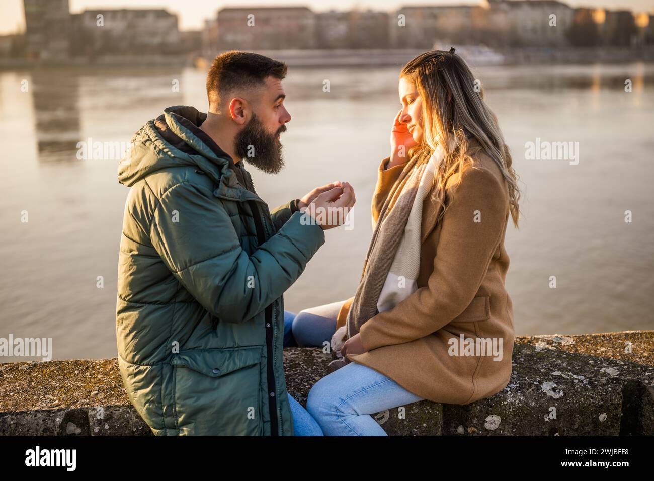 Couple having conflict and they are arguing while sitting outdoor Stock ...