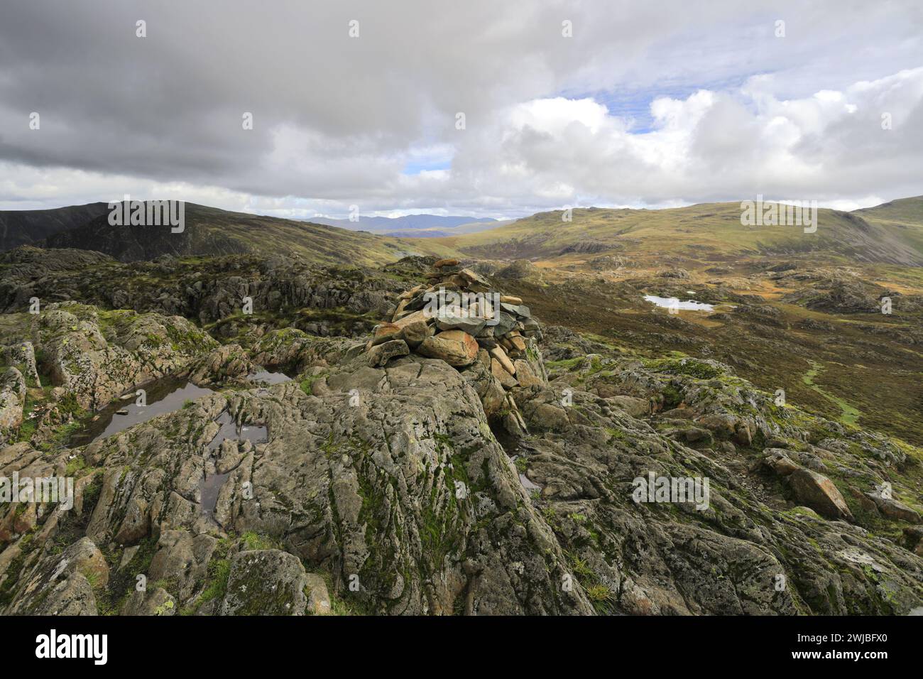 The summit carin of Haystacks Fell, overlooking Buttermere, Cumbria ...