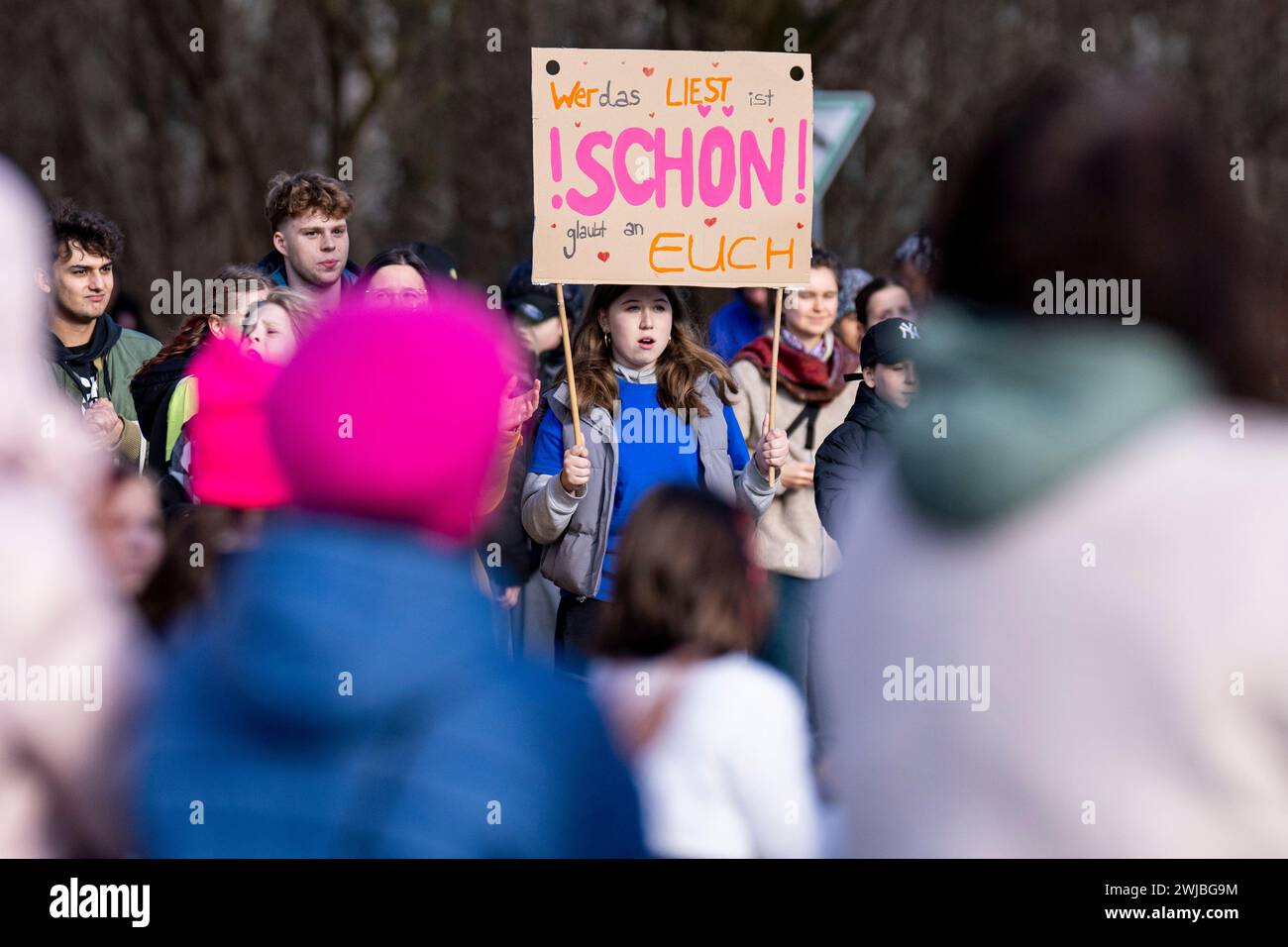 Munich, Germany. 14th Feb, 2024. Participants in a dance flash mob and ...