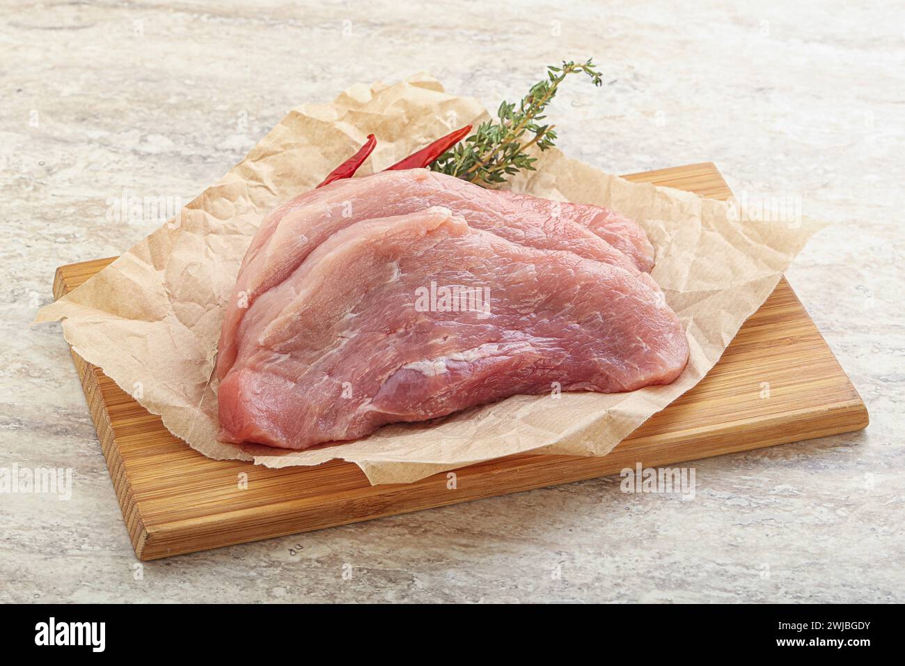 Raw pork schnitzel cut for roast Stock Photo - Alamy
