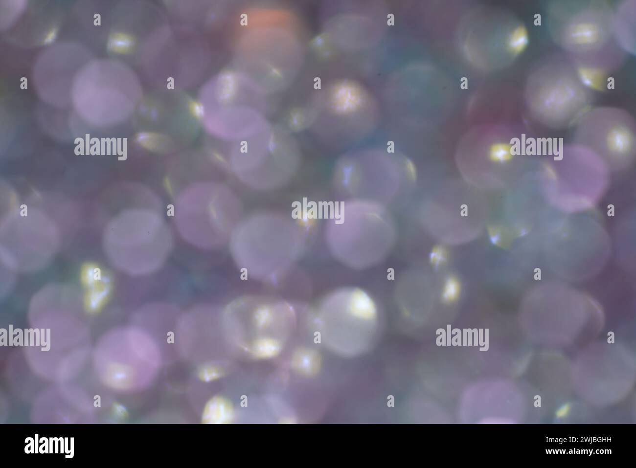 Colored photo background out of focus photographed with lens flares as ...
