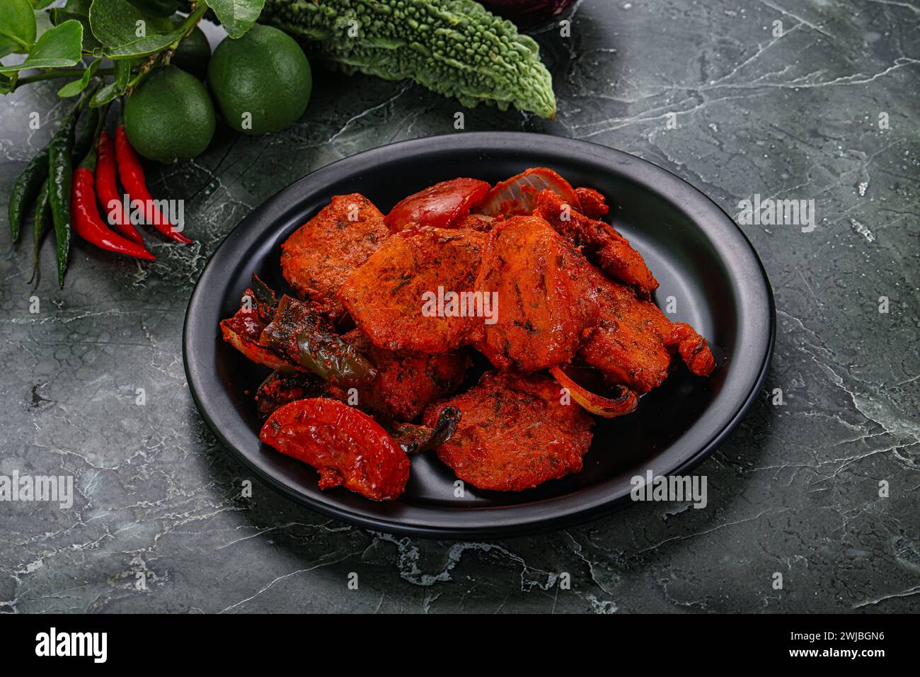 Indian cuisine - chicken red tikka barbecue Stock Photo - Alamy