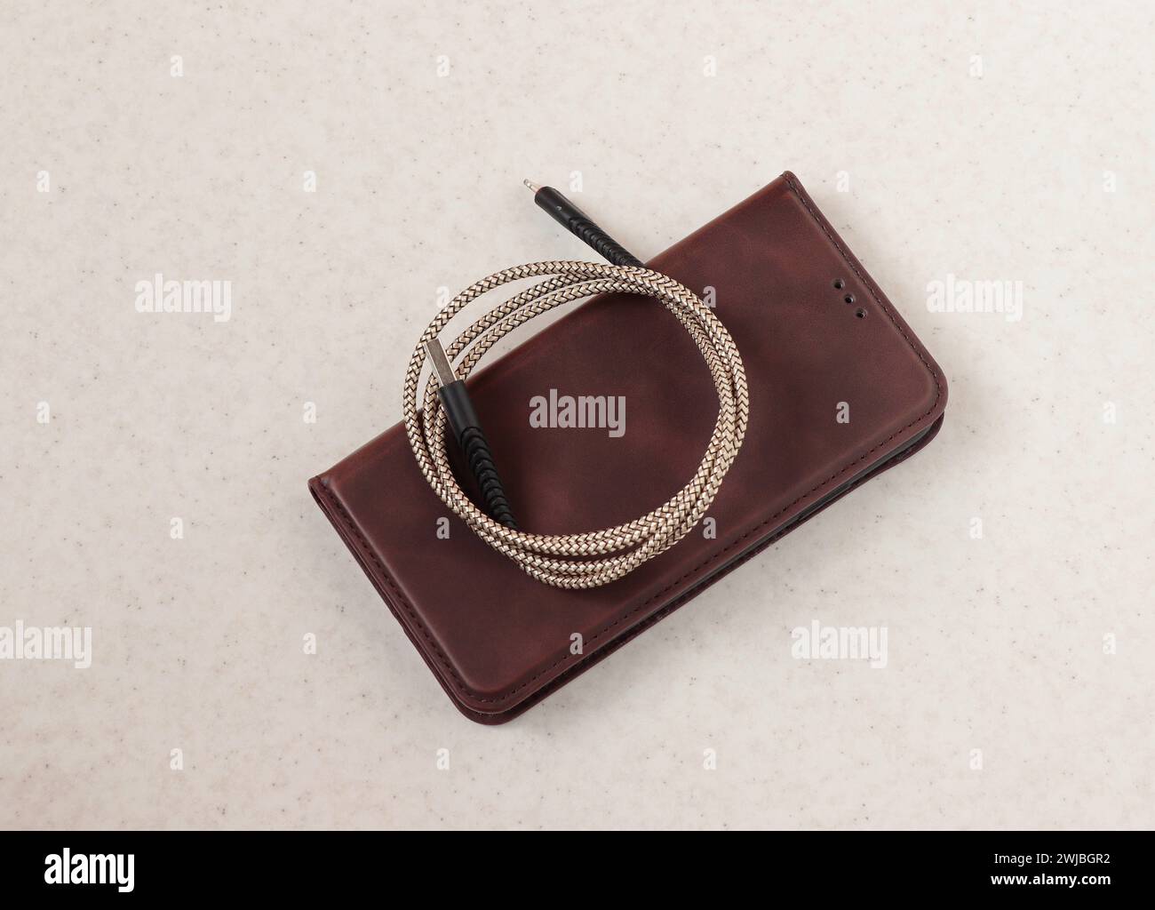 Smartphone, case, cord, ring, light background Stock Photo - Alamy