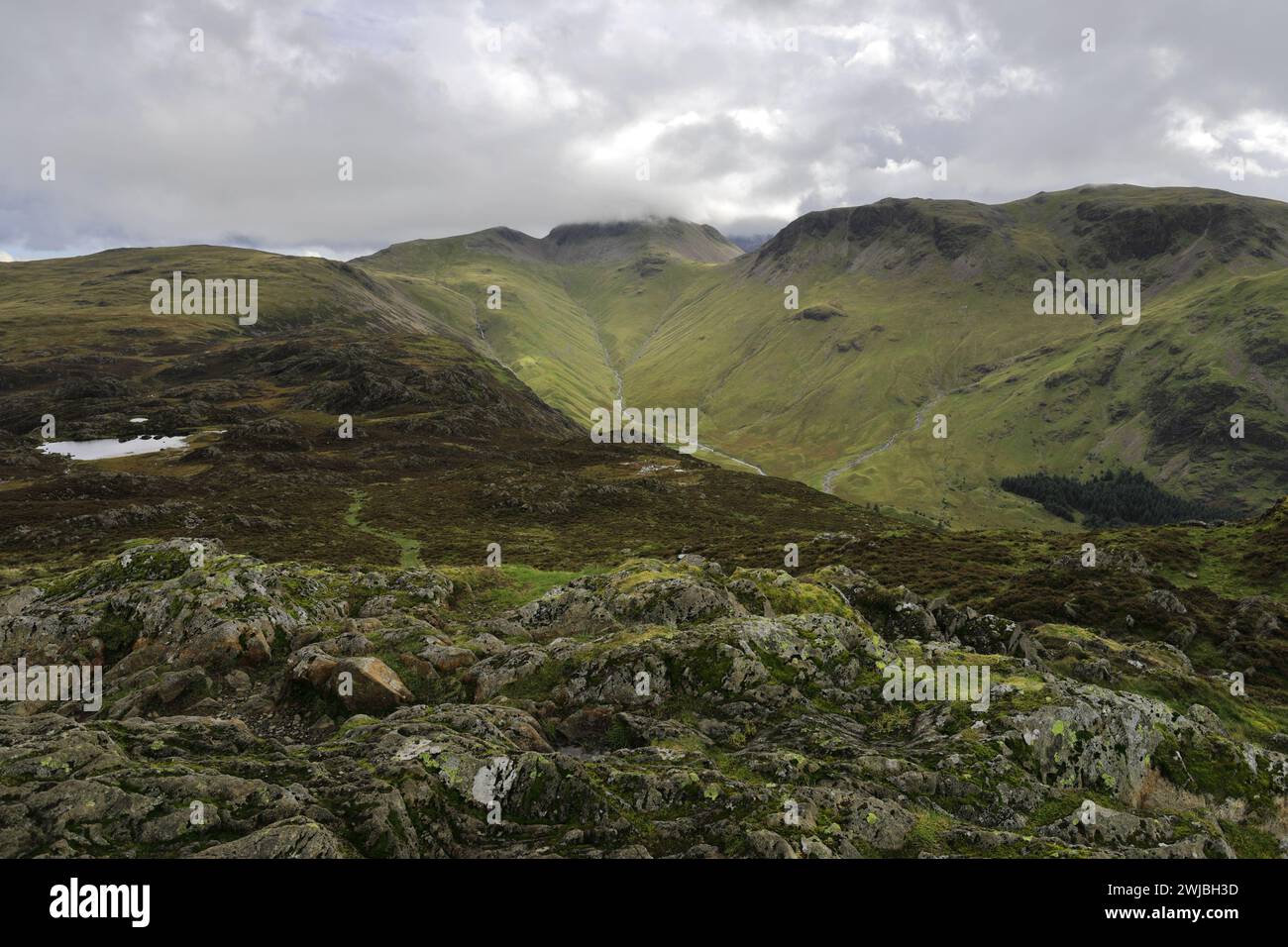 The summit carin of Haystacks Fell, overlooking Buttermere, Cumbria ...