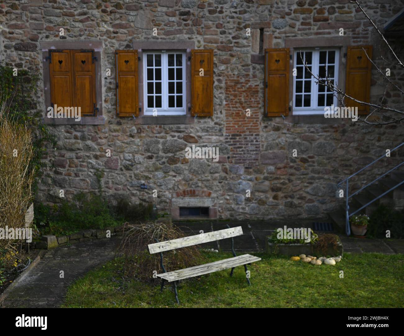 Landscape with scenic exterior view of a traditional Alsatian rural ...