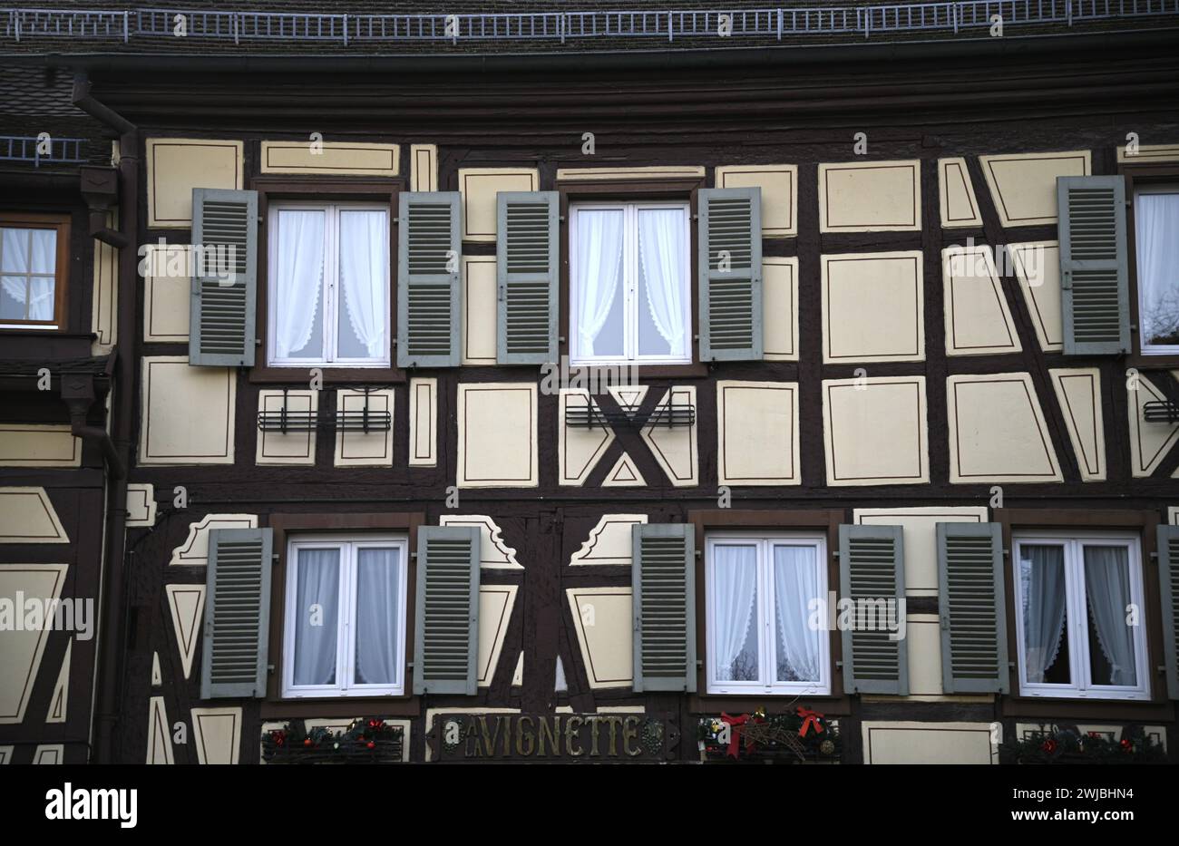 Landscape with scenic facade view of a traditional Alsatian half ...