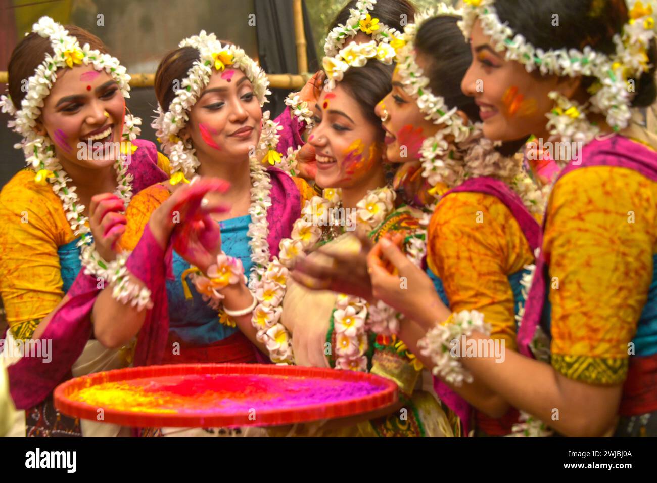 Dhaka. 14th Feb, 2024. Women attend the celebration of the Pohela ...