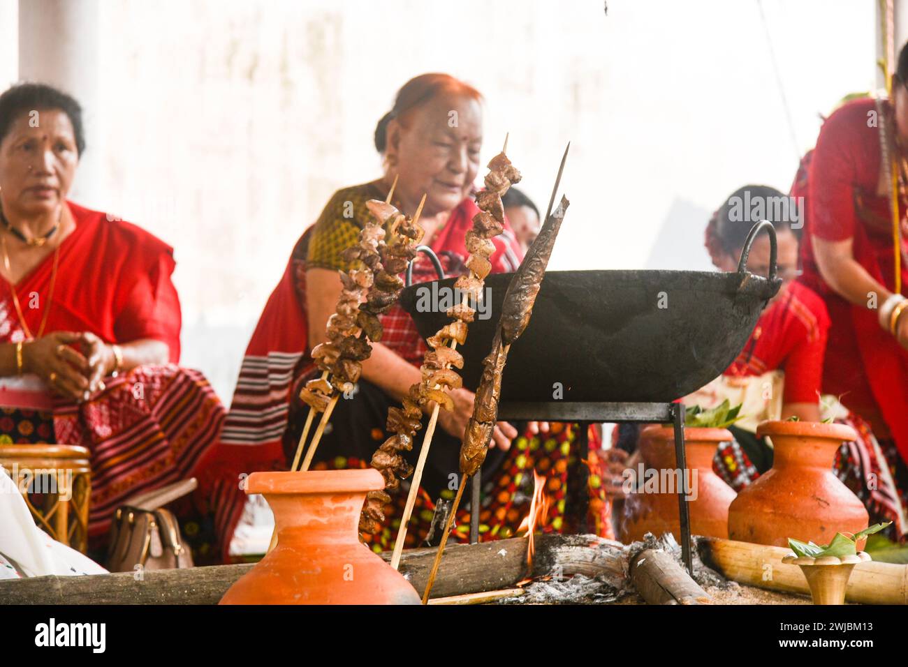 GUWAHATI,INDIA-14 FEBRUARY 2024: Mising tribal people preparing ...