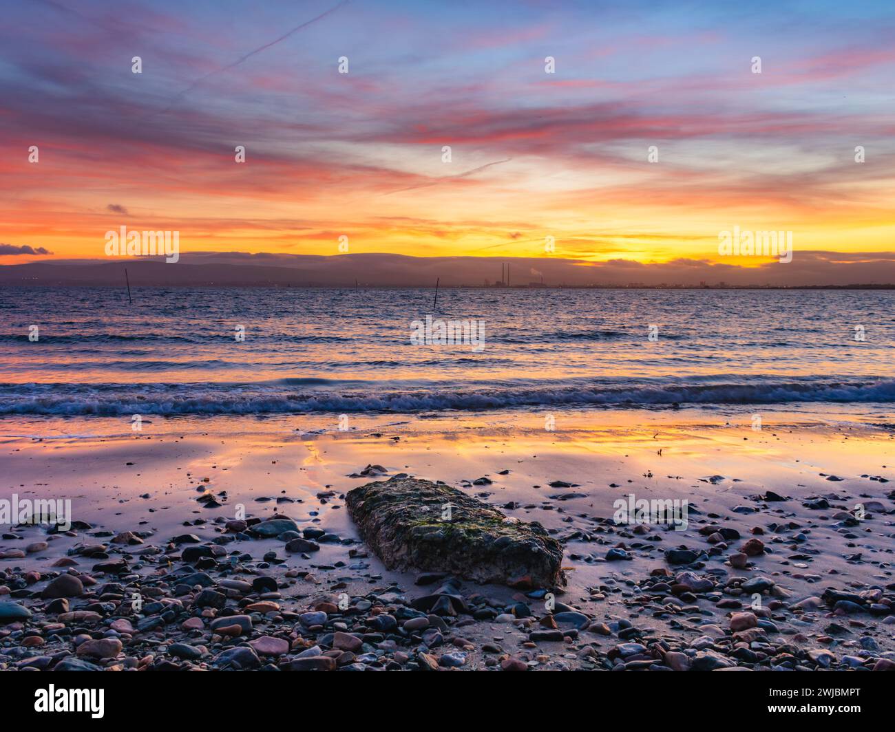 Colourful sunset sky at Sutton Strand Stock Photo - Alamy