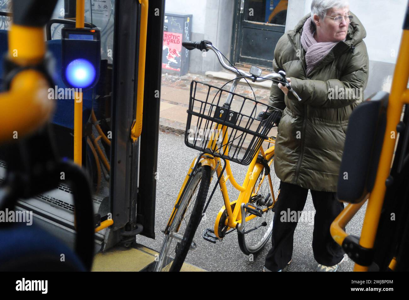 Copenhagen, Denmark /14 February 2024/. bike rider transport bike with ...