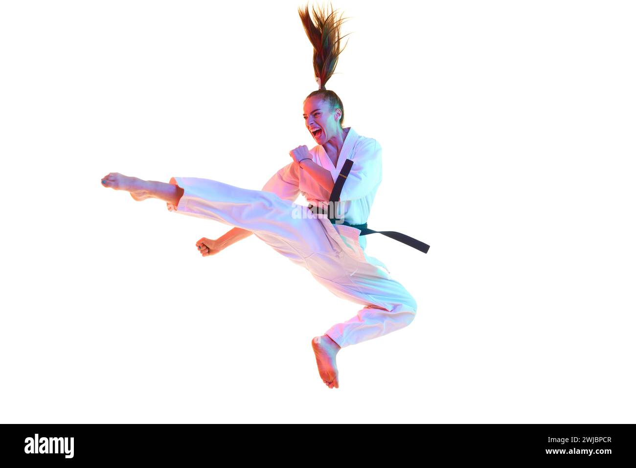 Female karate fighter, karate master jumping, training in action ...