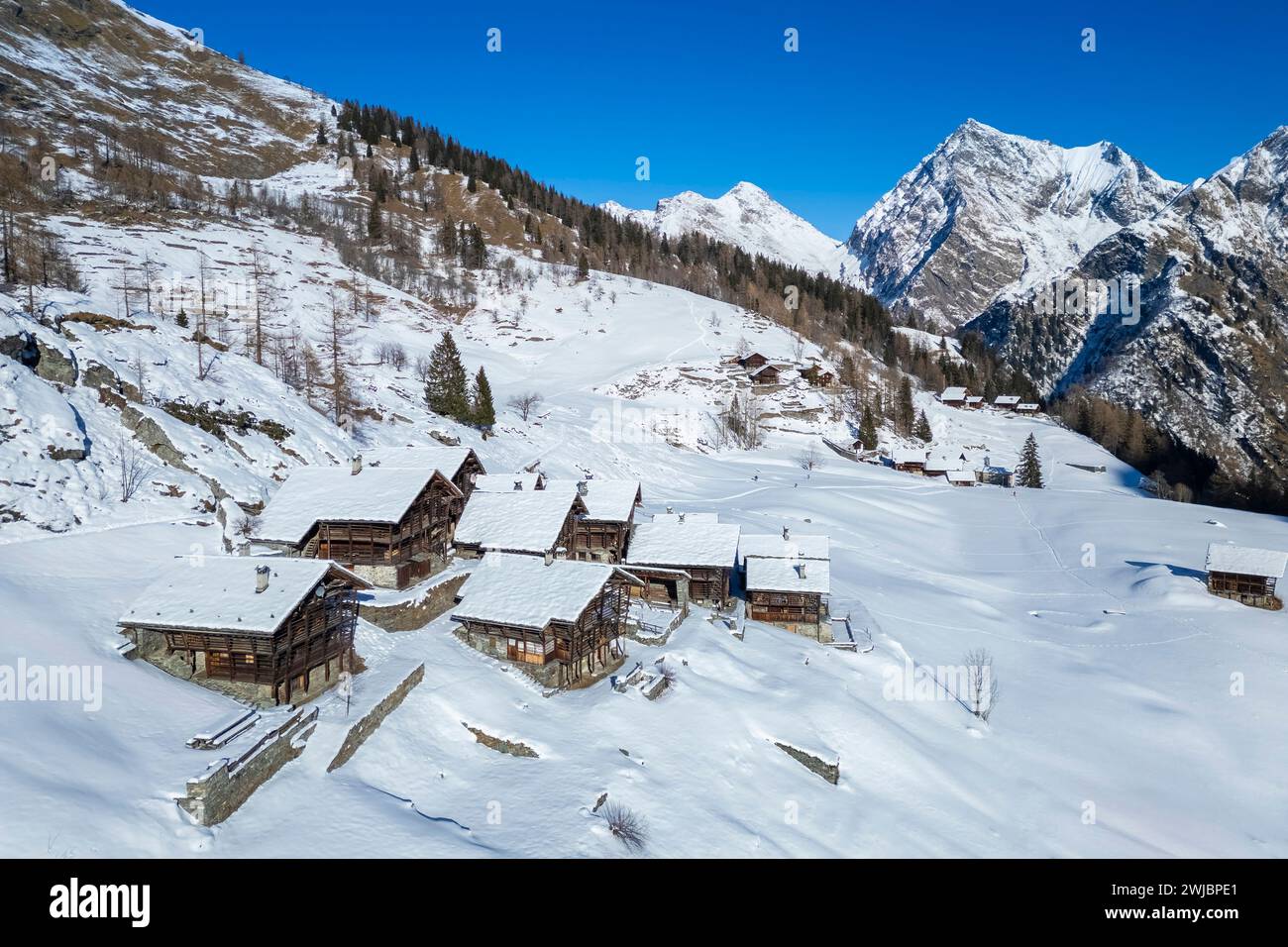 Aerial view of walser huts in Alpe Otro in winter. Alagna, Valsesia ...