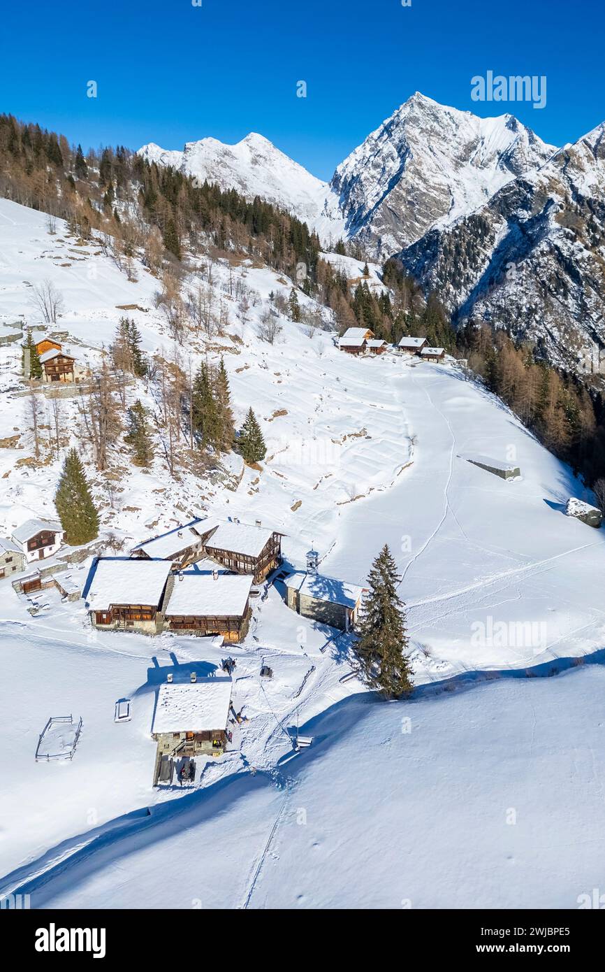 Aerial view of walser huts in Alpe Otro in winter. Alagna, Valsesia ...