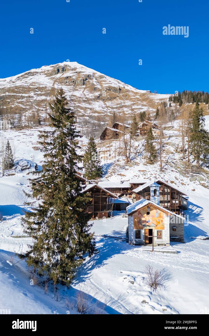 Aerial view of walser huts in Alpe Otro in winter. Alagna, Valsesia ...