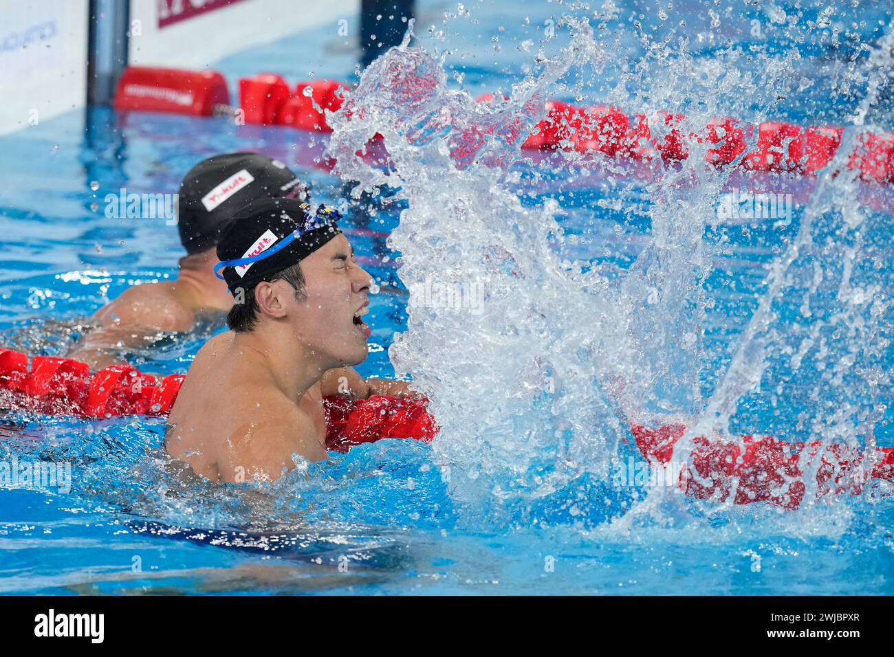 Tomoru Honda of Japan celebrates after competing in the men's 200-meter ...