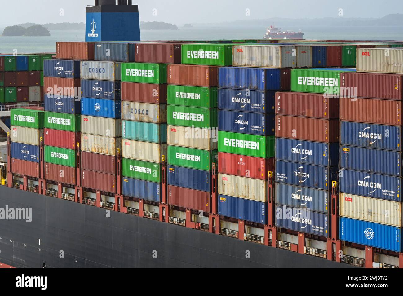 Colon, Panama - 22 January 2024: Shipping containers stacked high on a ...