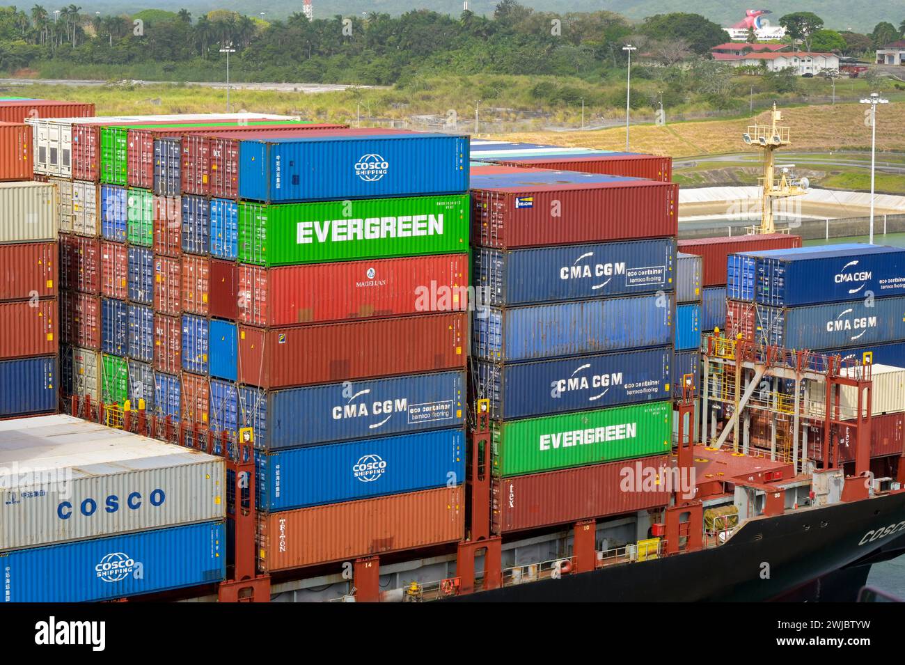 Colon, Panama - 22 January 2024: Shipping containers stacked high on a ...