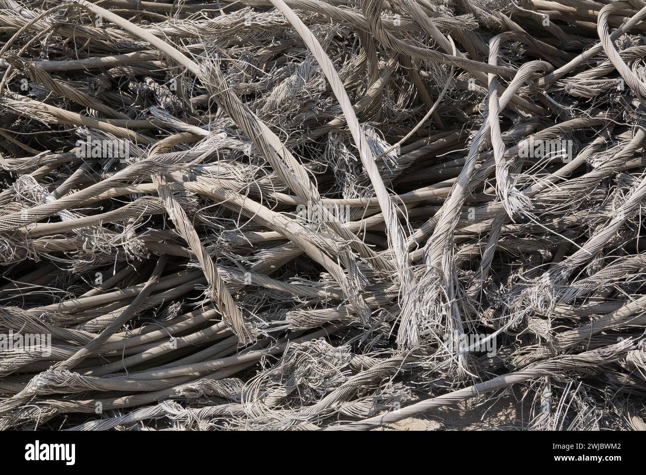 Discarded steel wire cables at scrap metal recycling yard Stock Photo ...