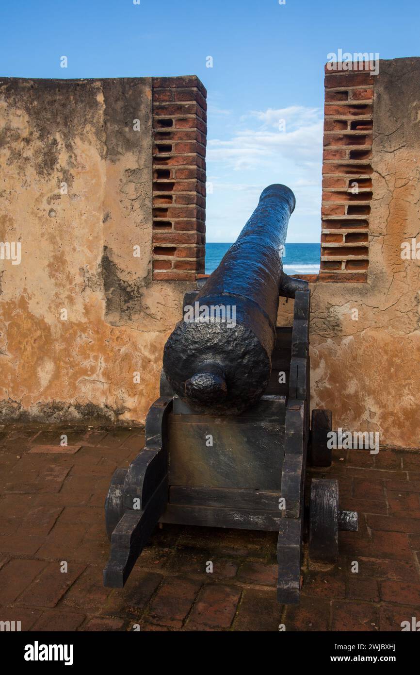 A colonial Spanish cannon overlooks the Atlantic Ocean at Fortaleza San ...