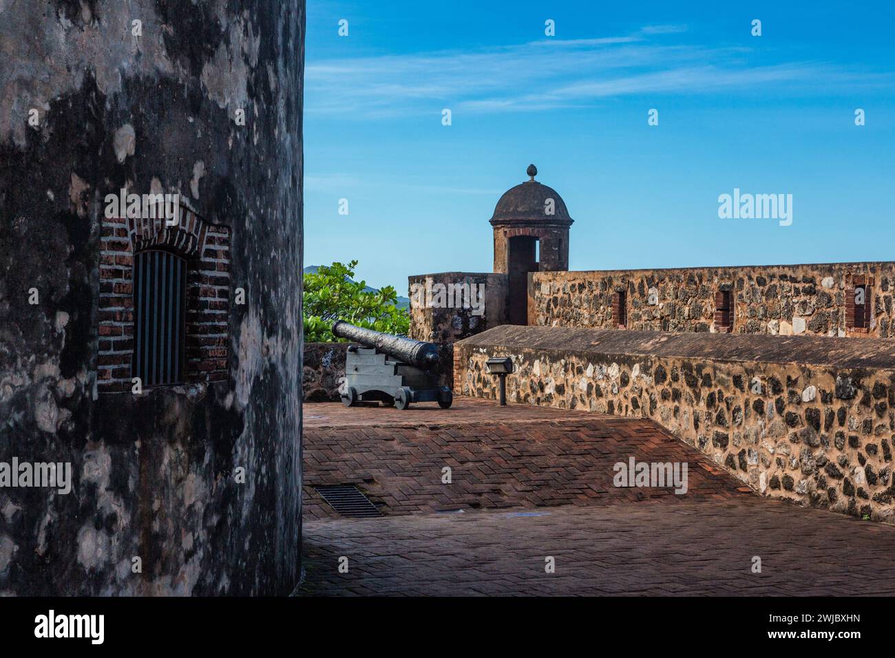 A Spanish cannon by a guerite or sentry box at Fortaleza San Felipe ...