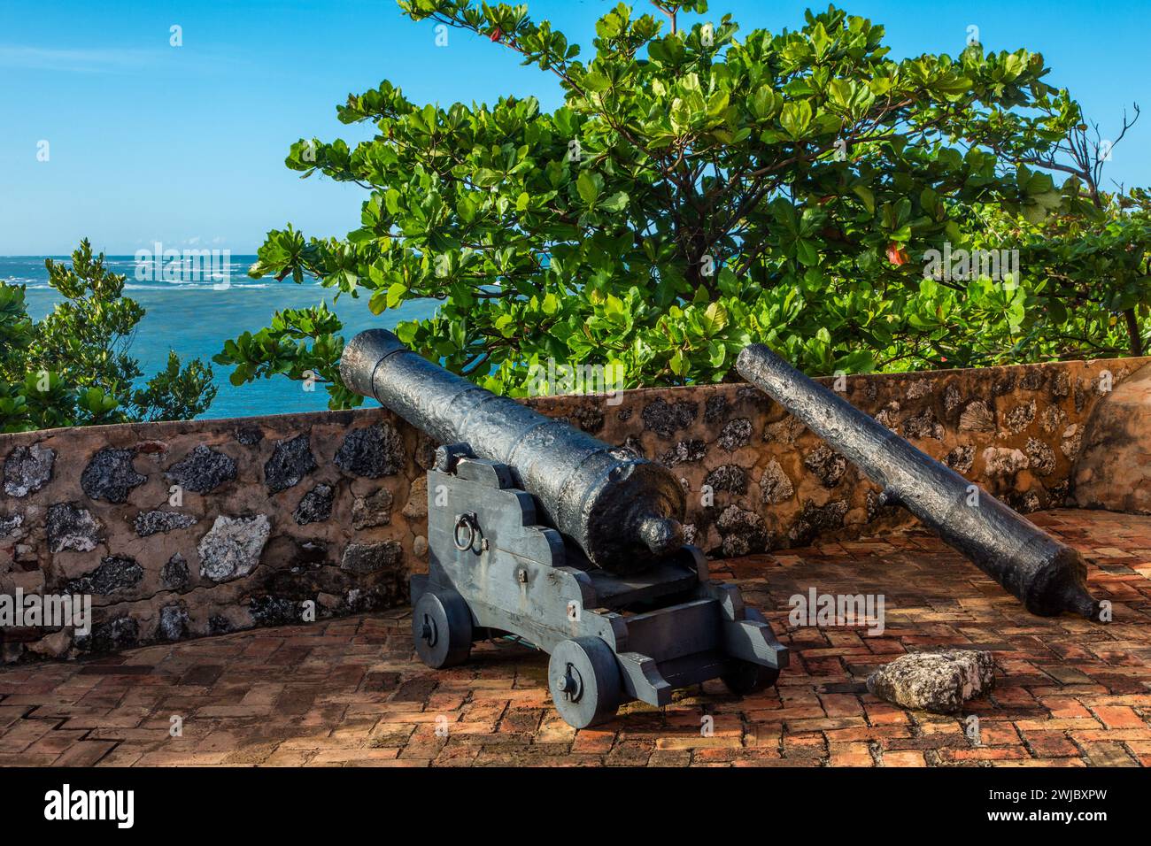 Colonial Spanish cannons overlook the Atlantic Ocean at Fortaleza San ...