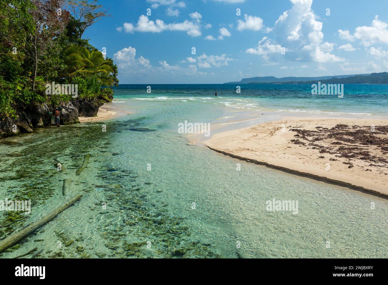 Clear waters of Cano Frio flowing into Atlantic Ocean at Rincon Beach ...