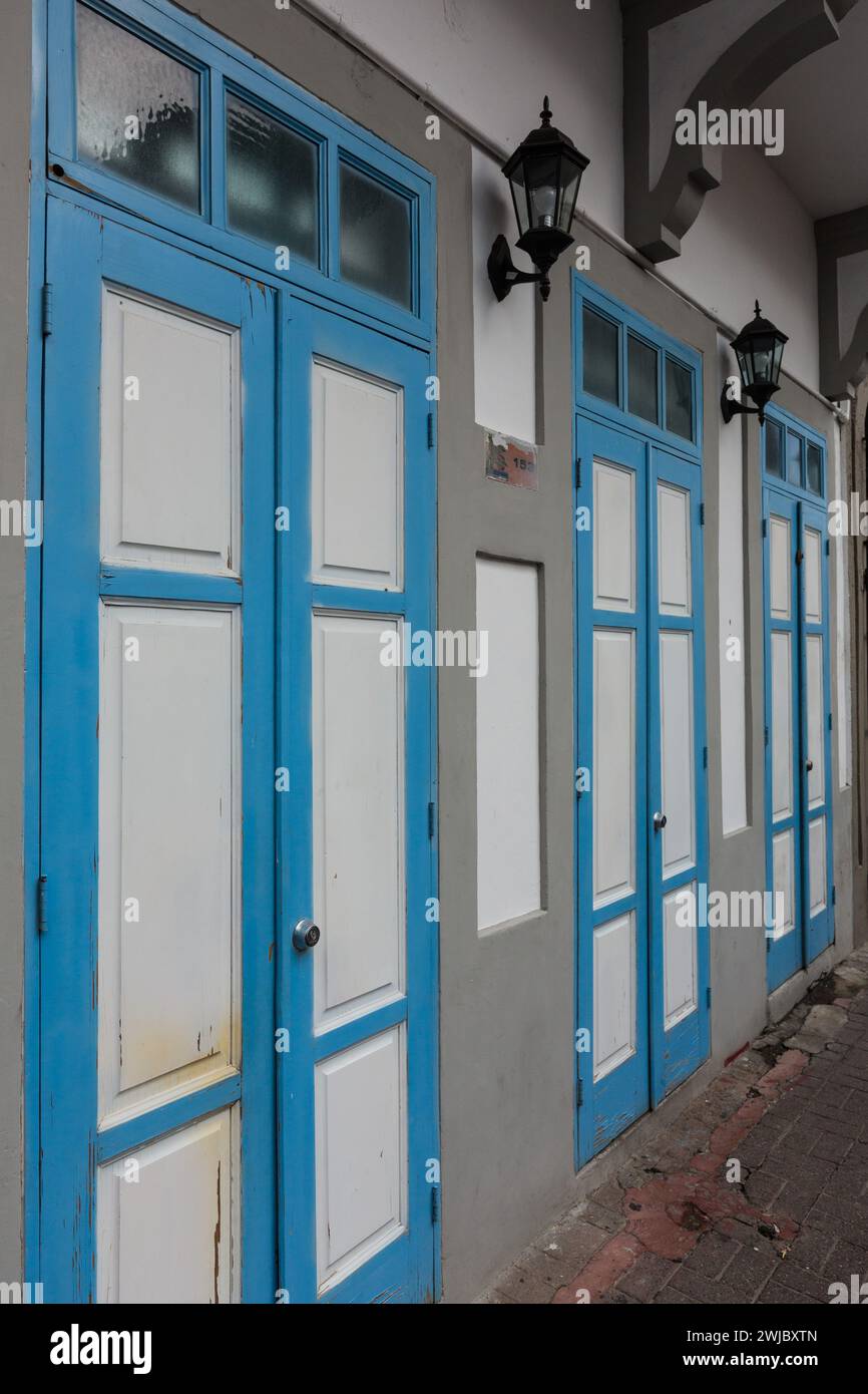 Colorfully painted doors on a building in the colonial sector of Santo ...