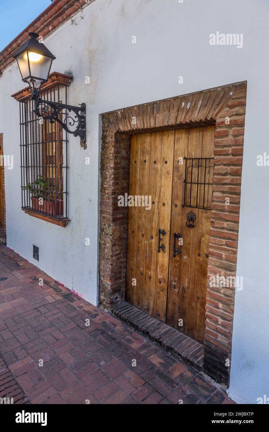 Wooden doorway in an old colonial building on Padre Billini Street ...