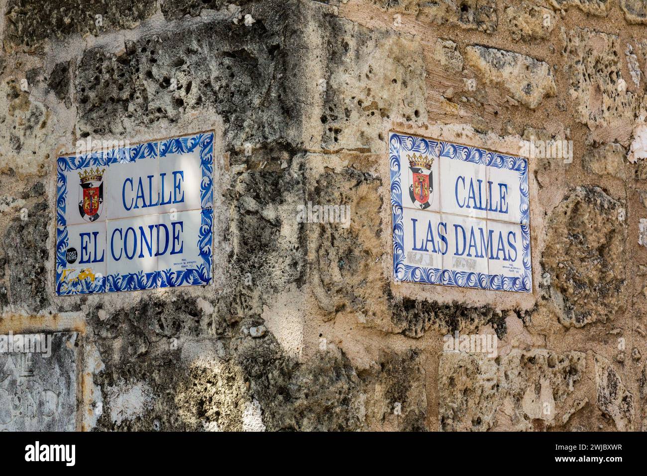 Sreet signs on the corner of Calle El Conde and Calle Las Damas in the ...