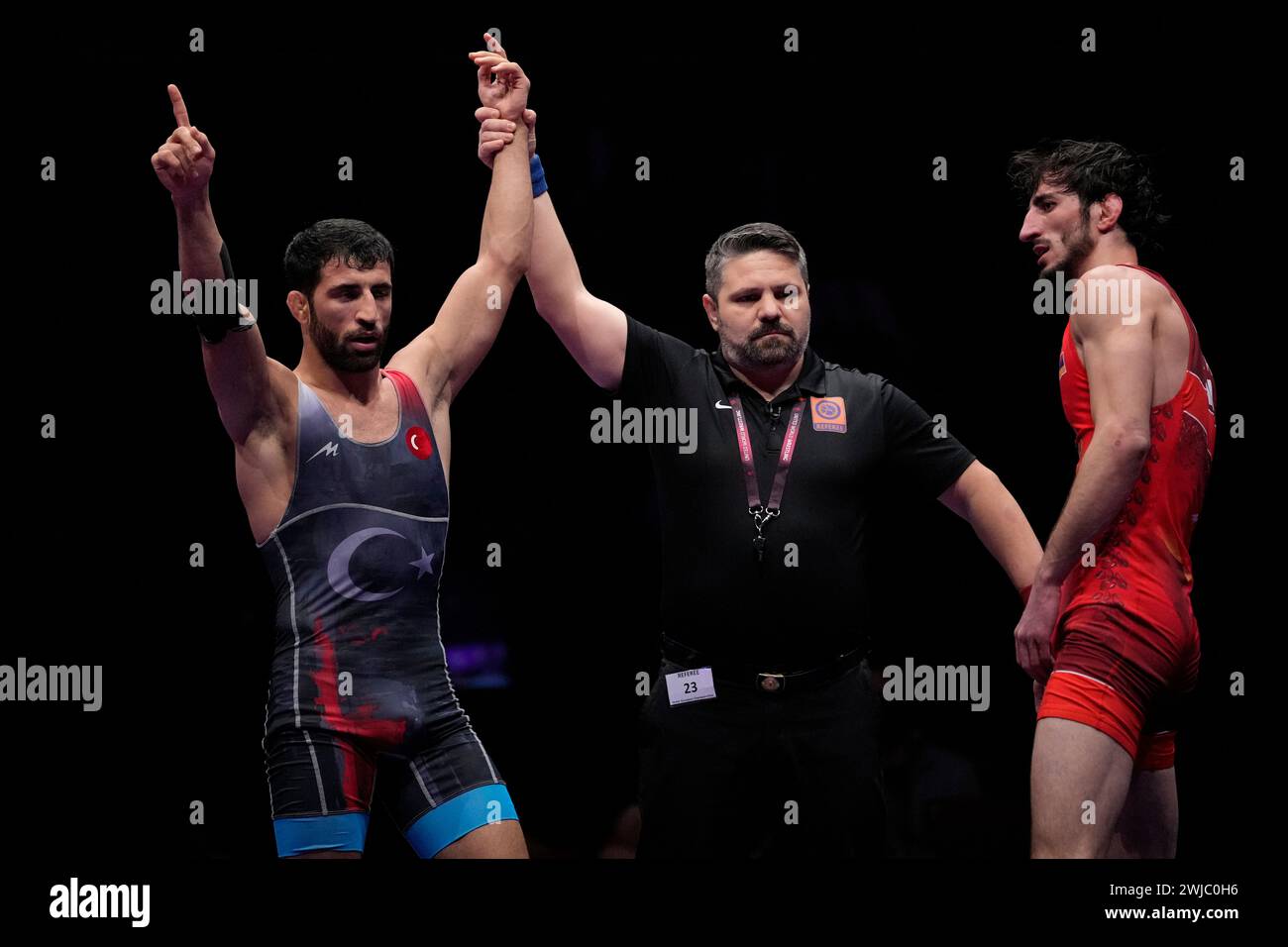 Turkey's Murat Firat, left, celebrates after defeating Armenia's Slavik ...