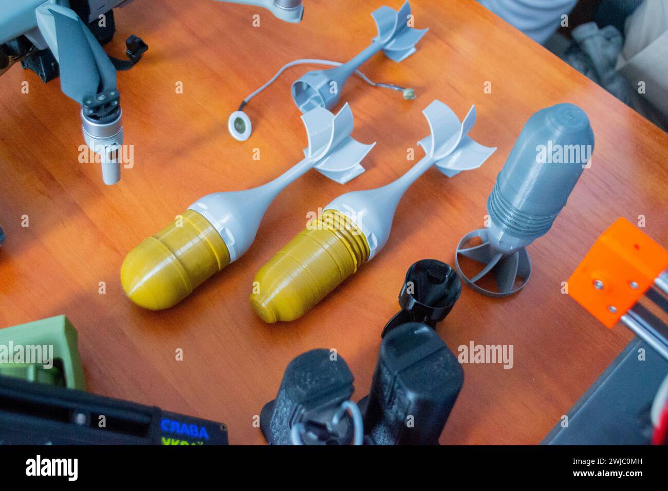 Prototype model of rocket bomb tip printed on 3D printer. Small colored ...