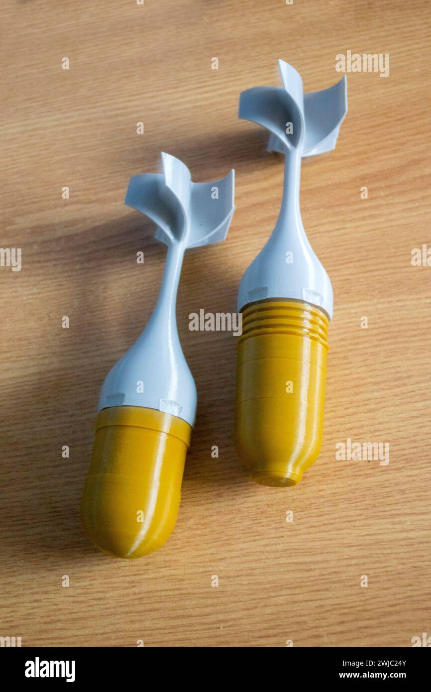 Prototype model of rocket bomb tip printed on 3D printer. Small colored ...